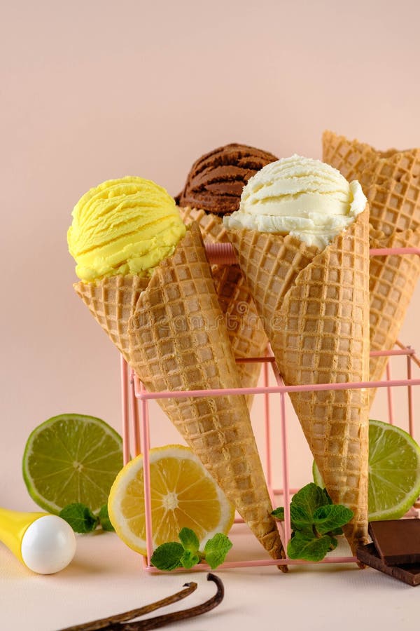Variety of Ice Cream Scoops in Cones with Chocolate, Vanilla and Lemon ...