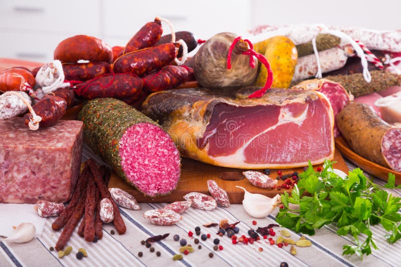 Variety of meats on table stock image. Image of variety - 238446605