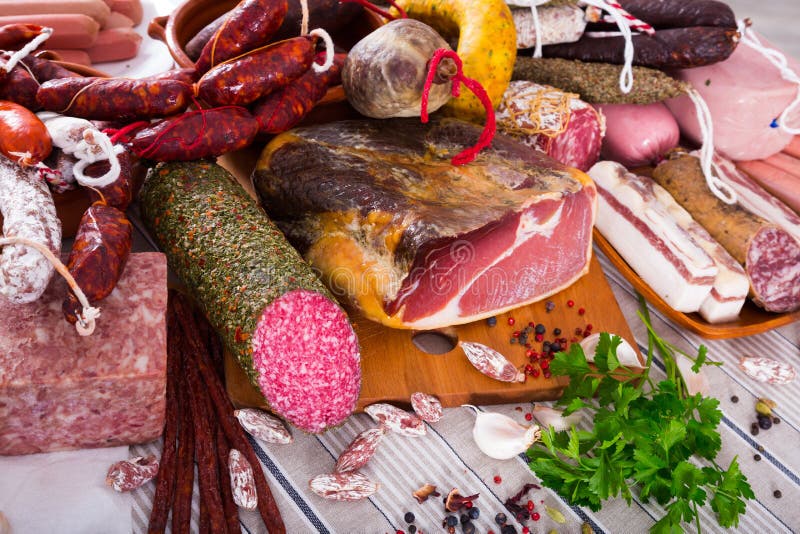 Variety of meats on table stock image. Image of appetite - 86794599