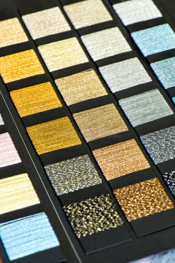 Variety of Metallic Threads on Sample Board Stock Image - Image of ...