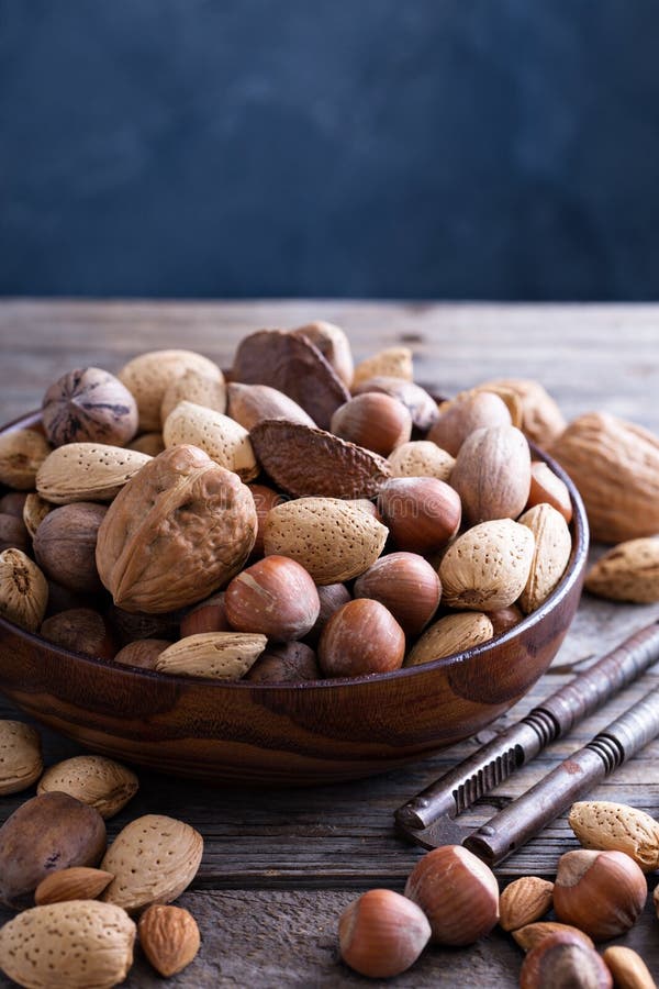 Variety of Nuts with Shells in a Bowl Stock Image - Image of almonds ...