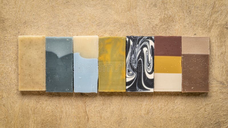 Variety of Organic, Artisan Soap Bars on a Textured Bark Paper Stock ...