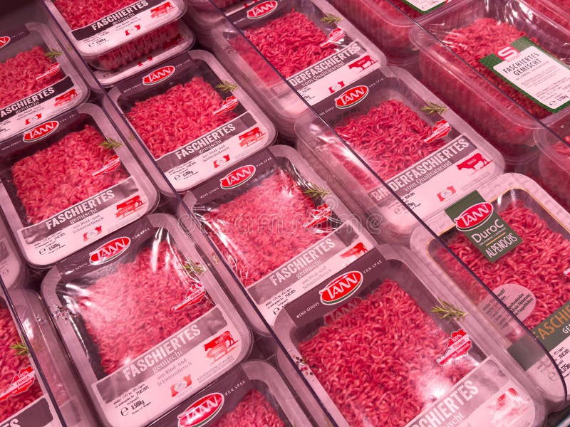 Variety of Packaged Ground Meat in Supermarket Refrigerated Display ...