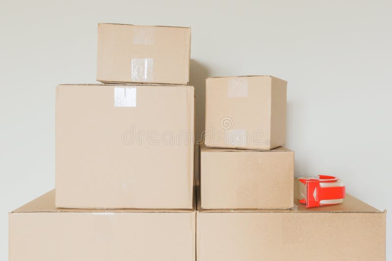 Variety of Packed Moving Boxes in Empty Room Stock Image - Image of ...