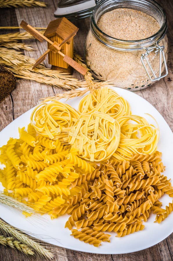 Variety of Pasta, Flour and Rye Cones Stock Photo - Image of object ...