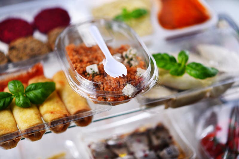 A Variety of Prepackaged Food Products in Plastic Boxes Stock Photo ...
