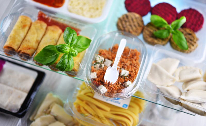 A Variety of Prepackaged Food Products in Plastic Boxes Stock Photo ...