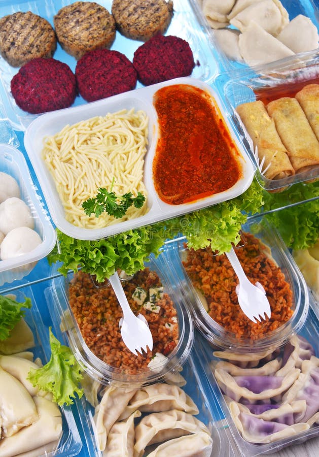 A Display of Prepackaged Food Products in Plastic Boxes Stock Photo ...