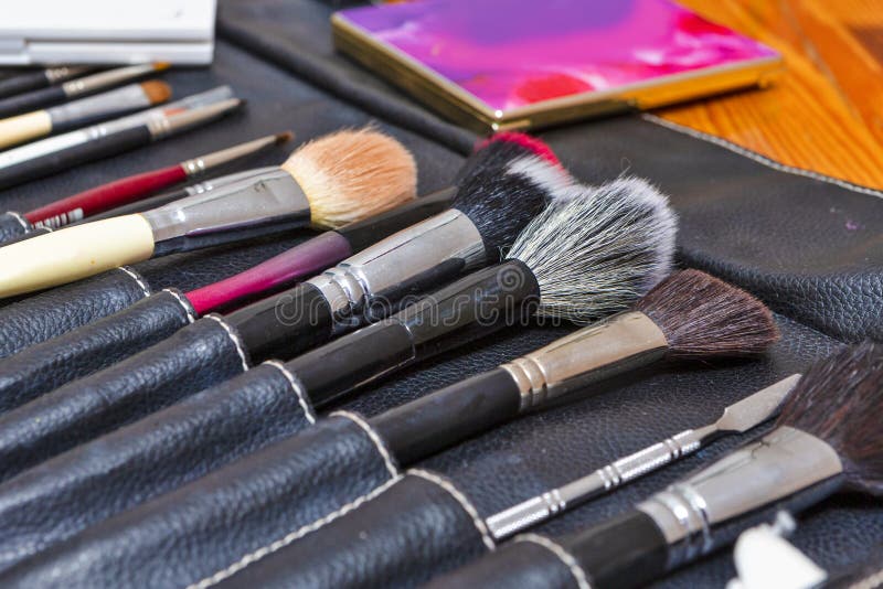 Variety of Professional Makeup Tools and Brushes with Eye Shadows ...
