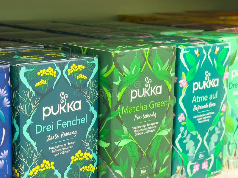 Variety of Pukka Herbal Tea Boxes with Bright Packaging on Display ...