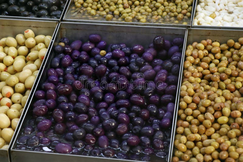 Variety Selection of Marinated and Pickled Olives in a Food Stall for ...