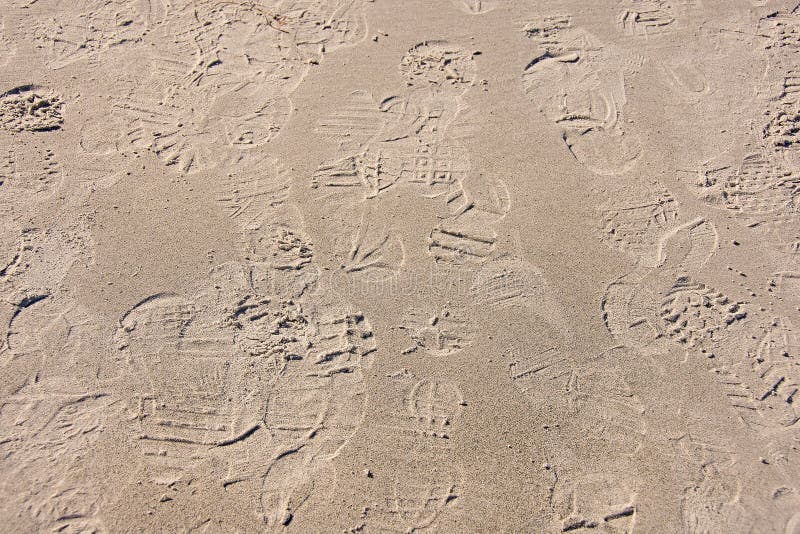 Shoe print pattern on sand stock image. Image of beach - 99395433