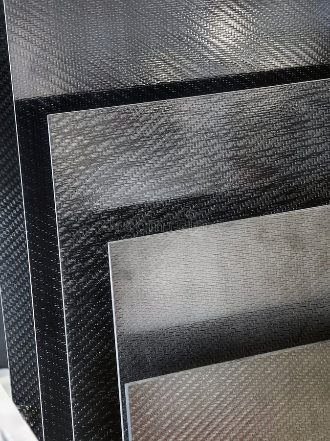 Variety of Sleek Carbon Fiber Sheets Arranged in a Stack Showcasing ...