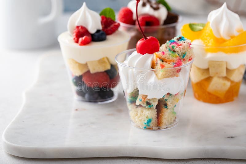 Variety of Small Desserts in Cups, Chocolate, Berry and Orange Stock ...