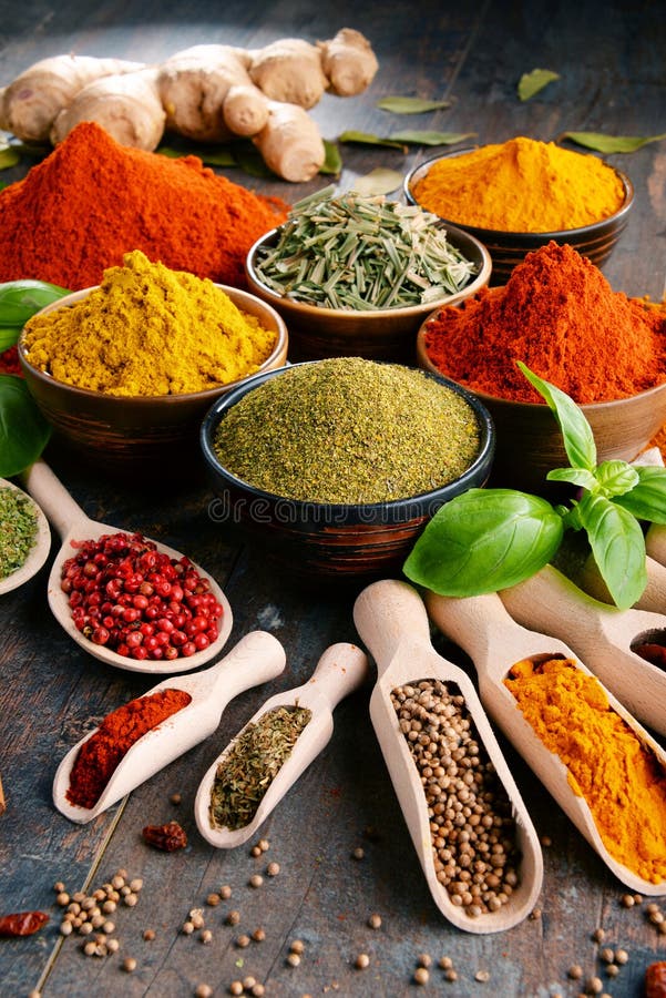 Variety of Spices and Herbs on Kitchen Table Stock Photo - Image of ...