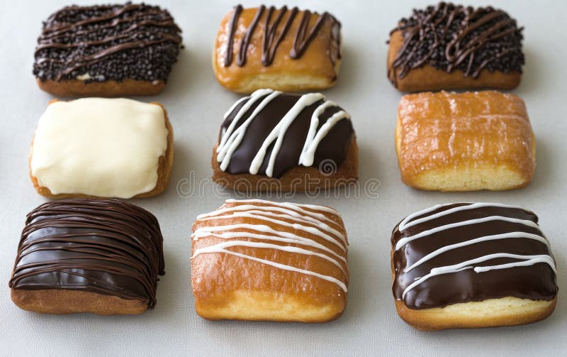 Variety of Square Donuts with Chocolate and Vanilla Icings Stock ...
