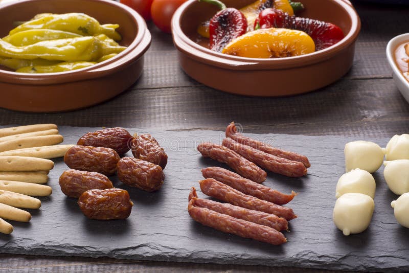 Variety of Starters on Wooden Table Stock Photo - Image of ...