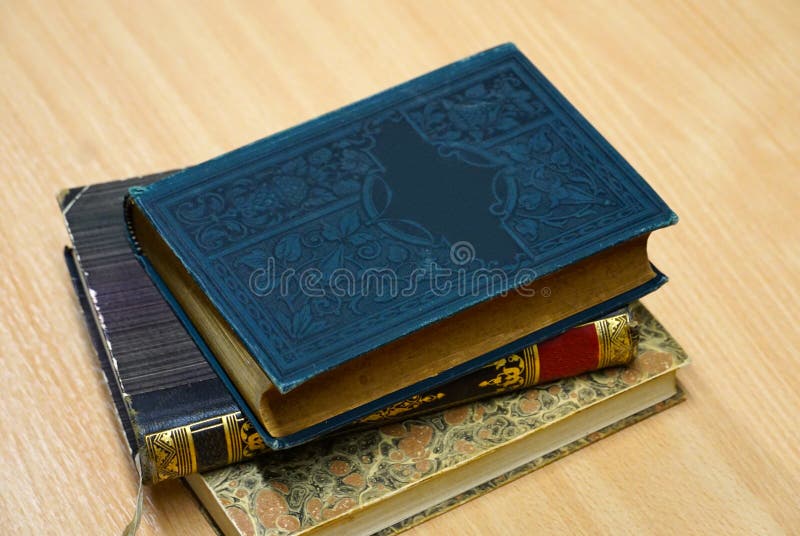 Various Antique Books on the Table with Beautiful Decorated Book Covers ...