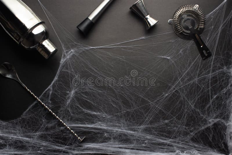 Various Bar Accessories Such Against the Backdrop of a Spider Web on a ...