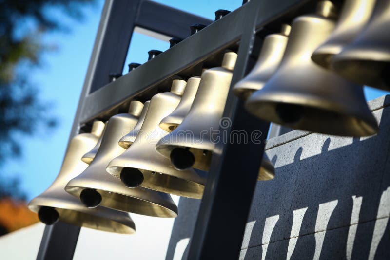 Various bells in a row stock photo. Image of sound, bell - 64663112
