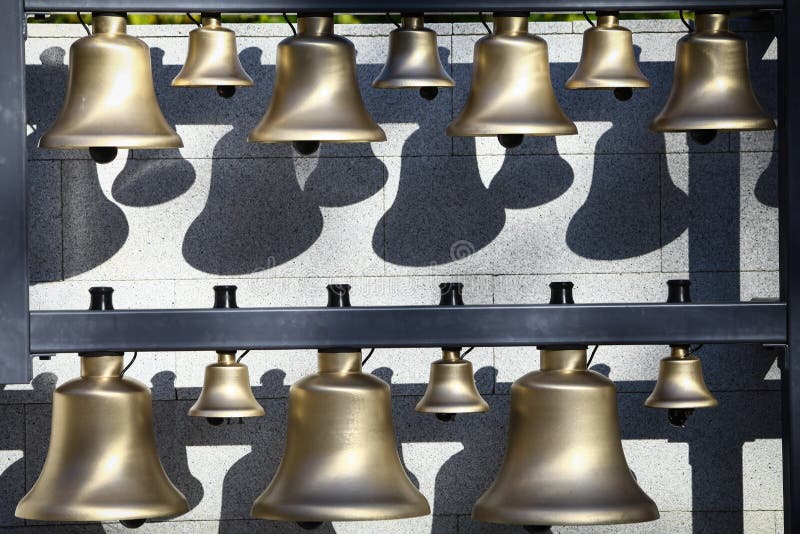 Various bells in a row stock image. Image of shiny, huge - 64991037
