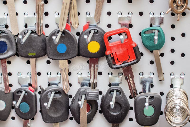 Various Blank Colorful Car Keys O a Special Wall Stock Photo - Image of ...