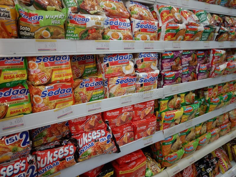 Various Brands of Instant Noodles Filled Rack Display in a Minimarket ...