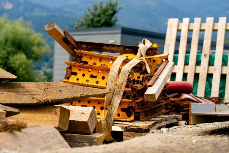 Various Building Materials and Fixtures Near a House Under Construction ...