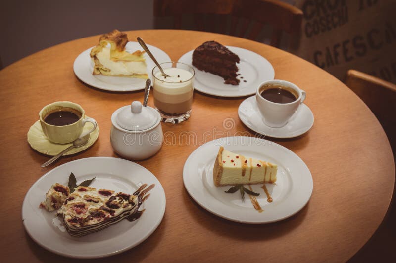 Desserts in a cafe stock photo. Image of chairs, holiday - 166221400