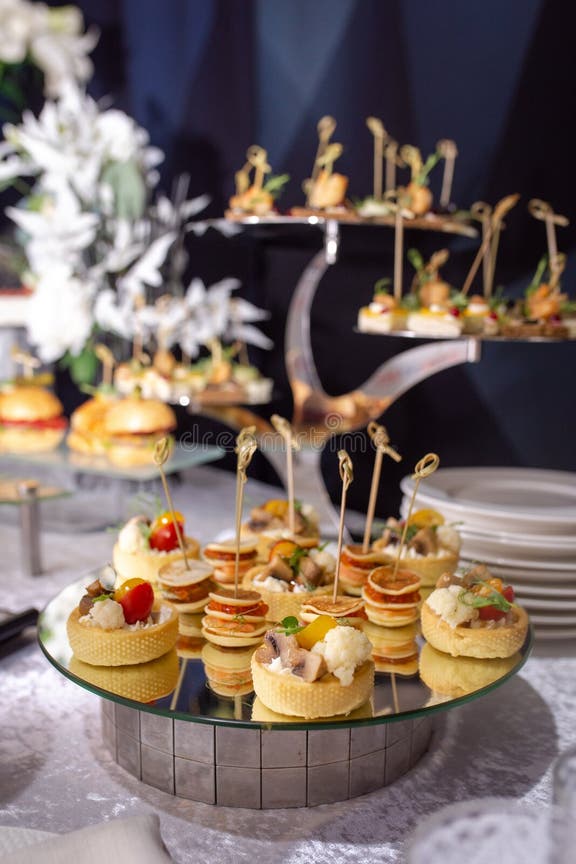 Various Canapes and Drinks on the Buffet Table on a Stand Stock Image ...