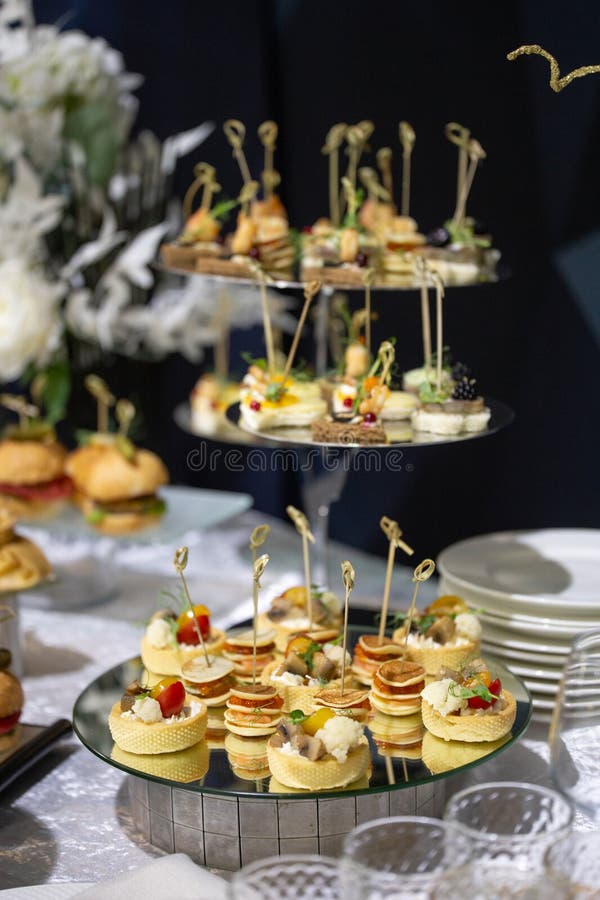 Various Canapes and Drinks on the Buffet Table on a Stand Stock Image ...