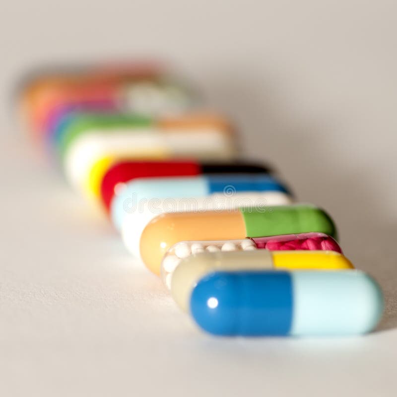 Various Capsules and Tablets in Row Stock Image - Image of pill ...