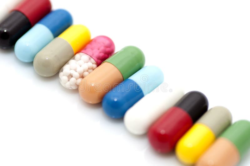Various capsules in row stock photo. Image of medicine - 36262996
