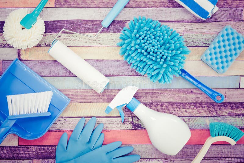 Various Cleaning Tools Placed on a Colorful Table Stock Image - Image ...