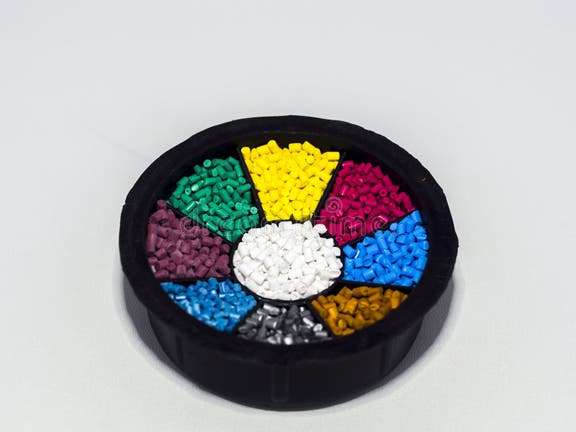 Various Colors of Masterbatch Granules in Black Palette Stock Image ...