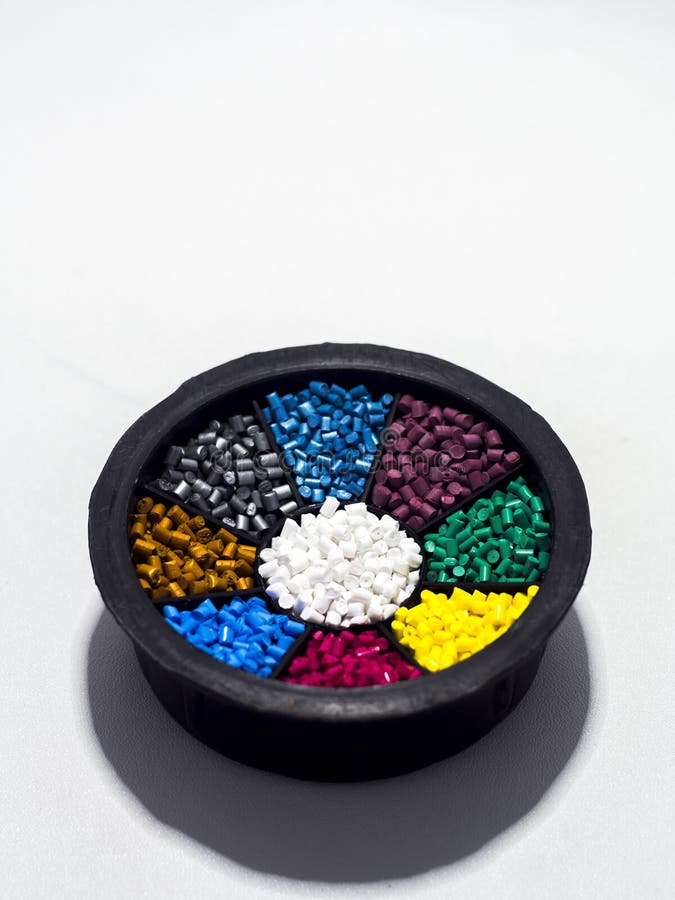 Various Colors of Masterbatch Granules in Black Palette Stock Image ...