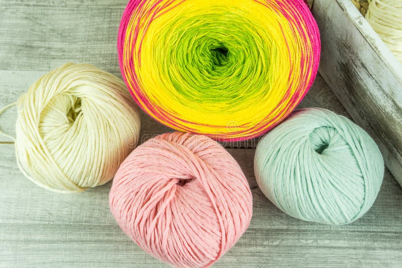 Various Colors Wool Balls in a Wooden Box with Knitting Needles Stock ...