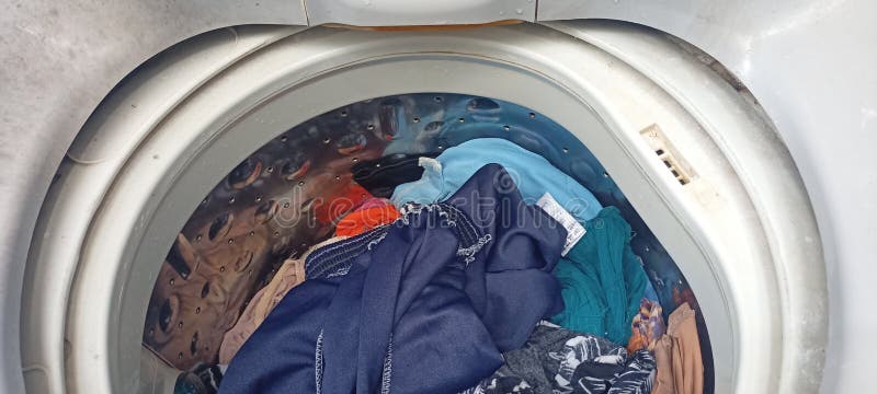 Various Colour of Clothes in the Washing Machine Stock Photo - Image of ...