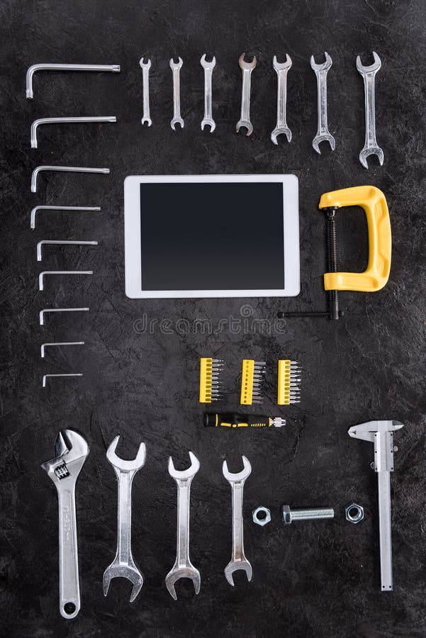 Various Construction Tools and Digital Tablet on Black Stock Image ...