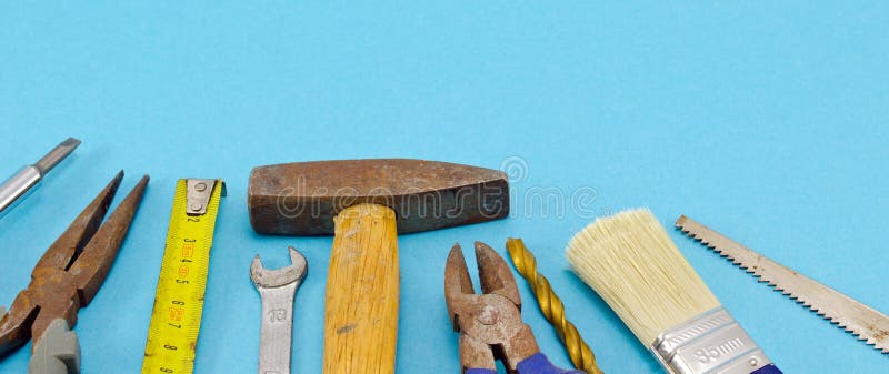 Various Construction Work Tools on Blue Stock Photo - Image of concept ...