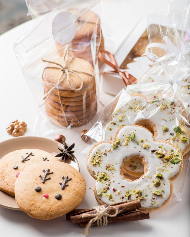 Various Cookies and Gingerbread with Glaze in Packages Stock Image ...