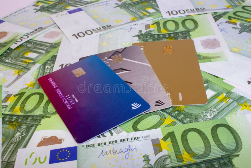 Various Credit Cards on a Heap of One Hundred Euro Banknotes Stock ...
