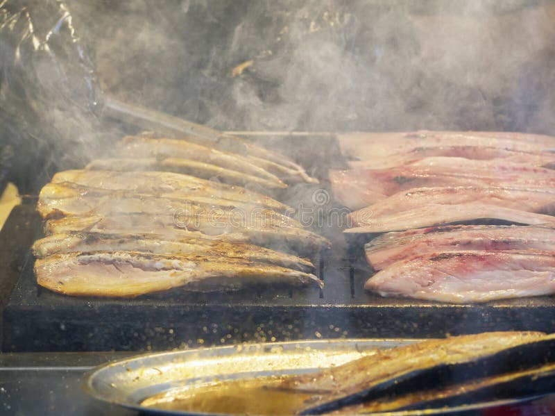 Smoked meats on grill stock photo. Image of food, freshness - 376880964