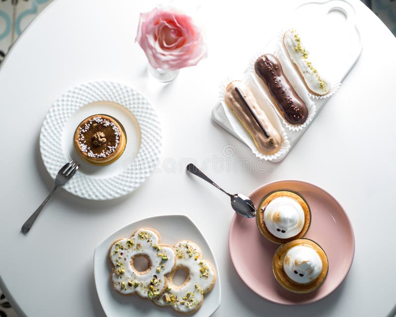 Various Desserts and Cakes, Eclairs on the Table. Top View Stock Photo ...