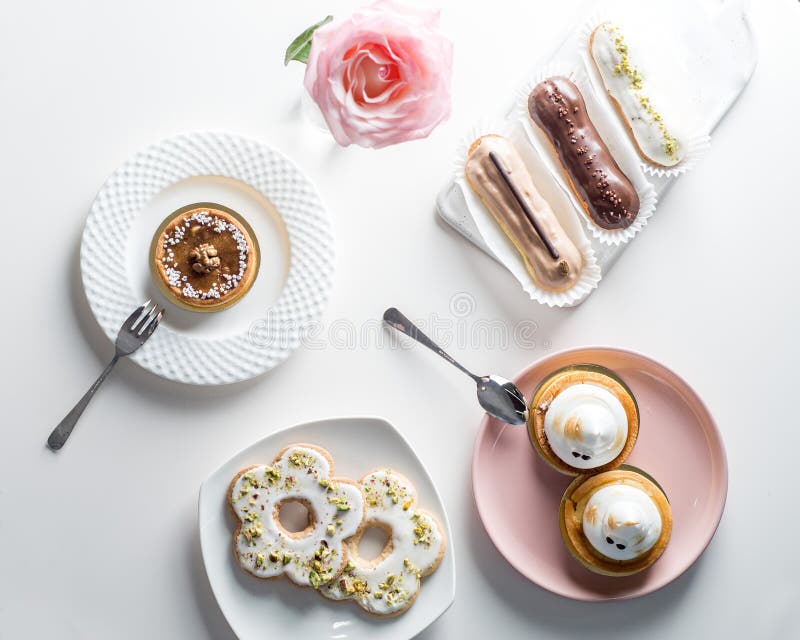 Various Desserts and Cakes, Eclairs on the Table. Top View Stock Photo ...