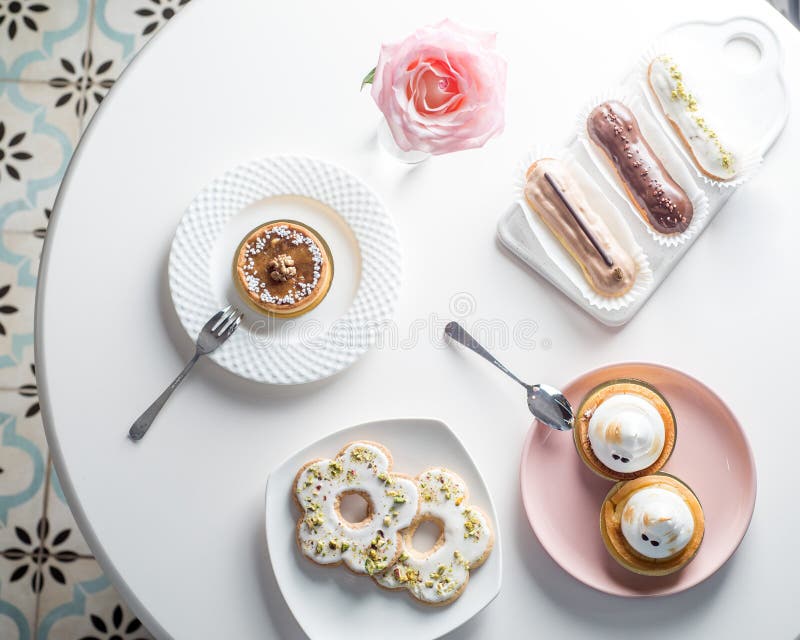 Various Desserts and Cakes, Eclairs on the Table. Top View Stock Image ...