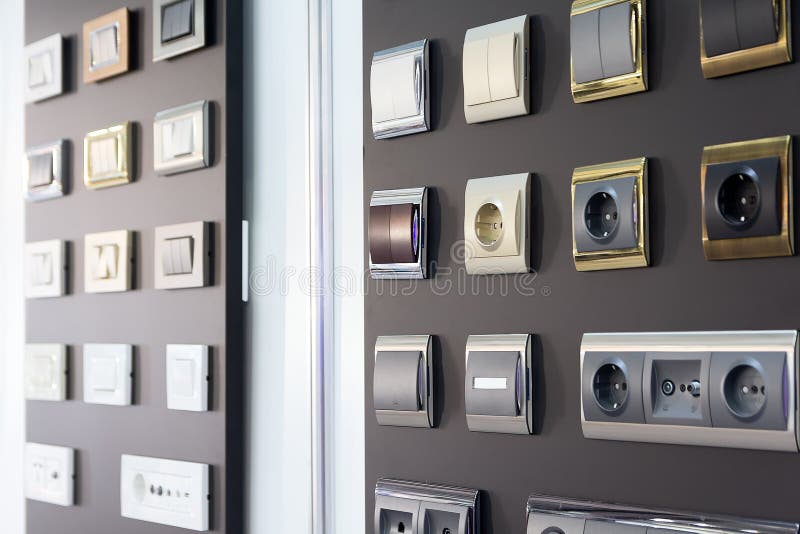 Various Electrical Switches and Sockets on the Stand in the Household ...