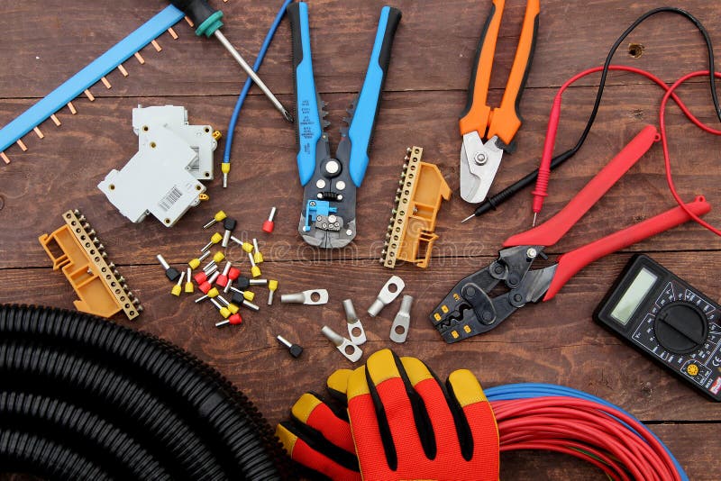 Tools for Electrical Work Laid Out on a Wooden Surface of Brown. Top ...