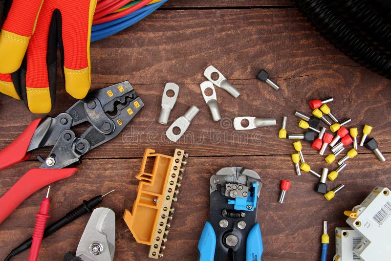 Tools for Electrical Work Laid Out on a Wooden Surface of Brown. Top ...