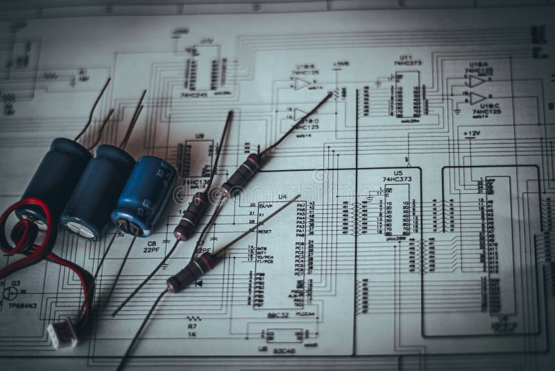 Various Electronic Components, on Top of a Schematic Sheet Stock Photo ...
